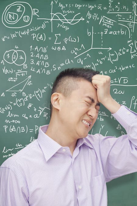 Frustrated Young Student in Front of Blackboard with Math Equations ...