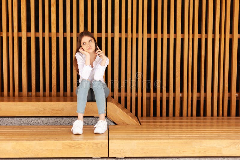 Frustrated Young Woman Talking on the Phone. Unpleasant Conversation ...
