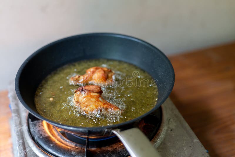 Fry the Chicken in a Pan with Boiling Oil Stock Image - Image of food ...
