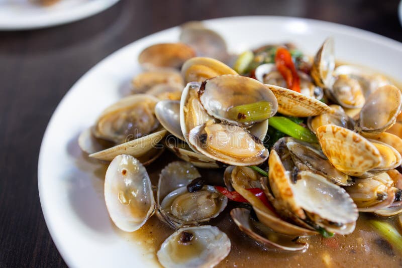 Fry with basil stock photo. Image of cooking, clams - 262943928