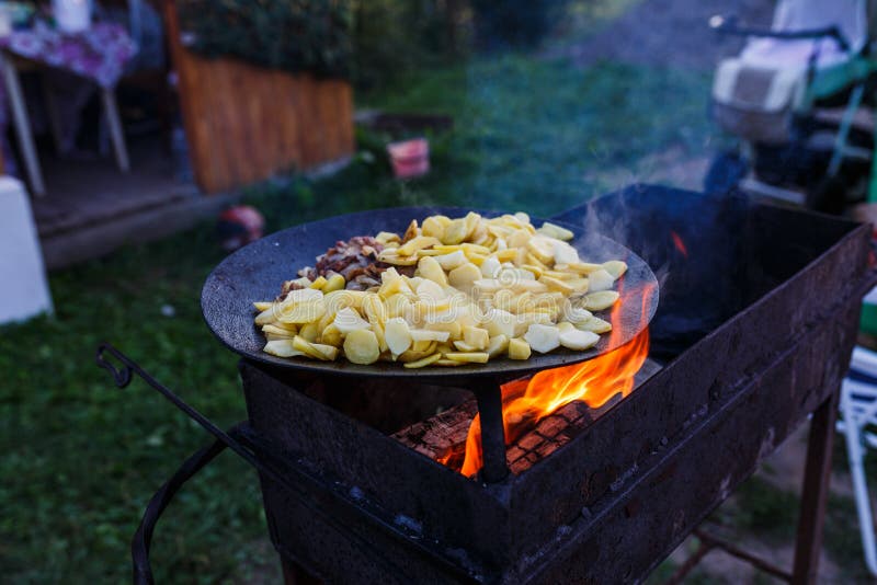 Fry Potatoes on Open Fire in the Open Air Stock Photo - Image of nature ...