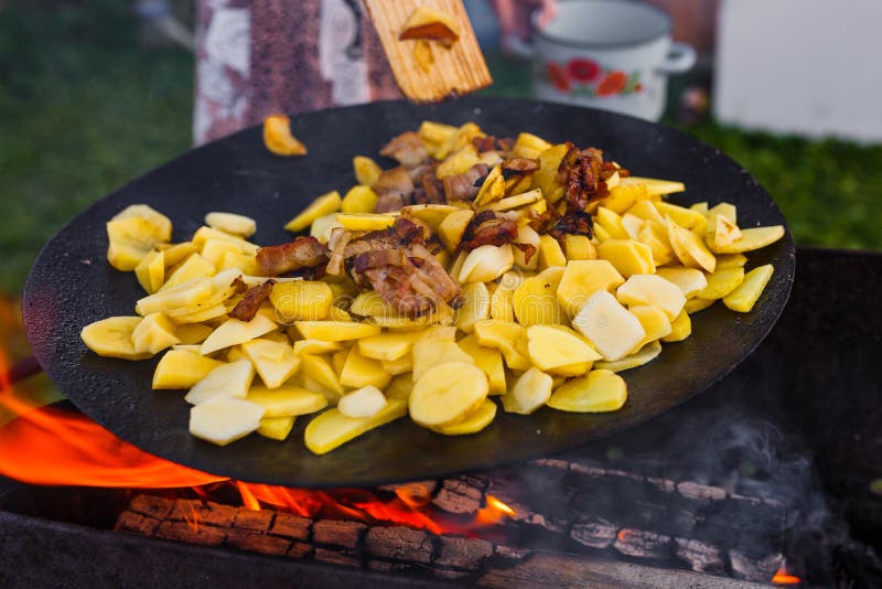 Fry Potatoes on Open Fire in the Open Air Stock Photo - Image of ...