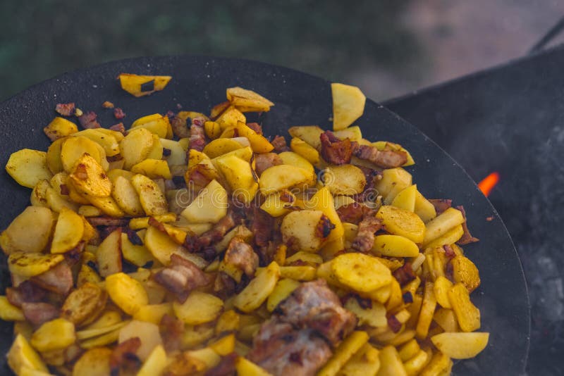 Fry Potatoes on Open Fire in the Open Air Stock Photo - Image of grill ...