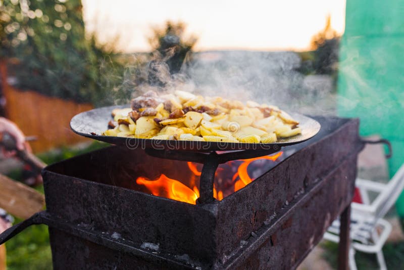 Fry Potatoes on Open Fire in the Open Air Stock Image - Image of party ...