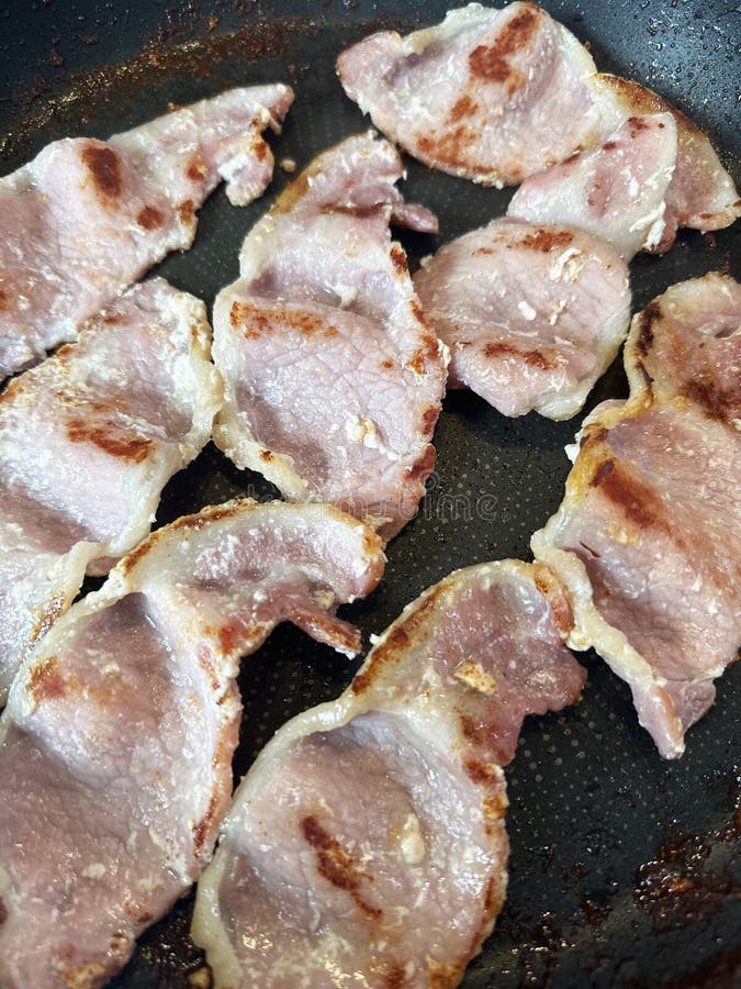 Frying bacon rashers stock photo. Image of brekfast - 327728966