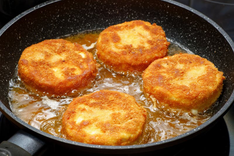 Frying breaded cheese stock photo. Image of czech, delicious - 338230878