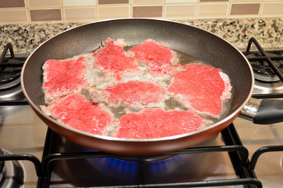 Frying breaded red meat stock photo. Image of delectable - 66914840