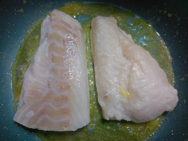 Uncooked pink cod fillets stock photo. Image of pink - 107064702