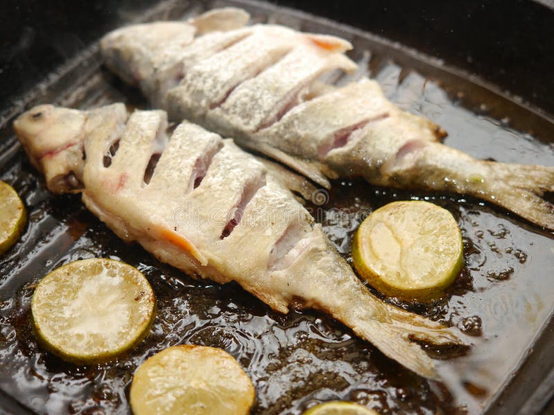 Frying cut fish stock image. Image of dining, freshness - 81527677