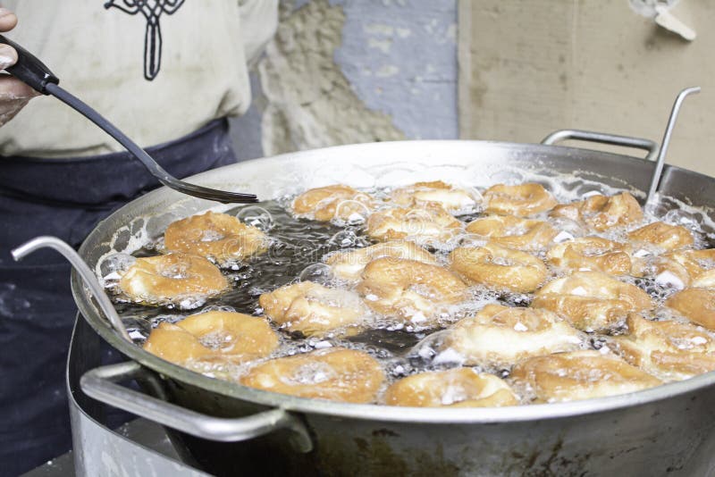Frying donuts stock image. Image of machine, delicious - 43813479