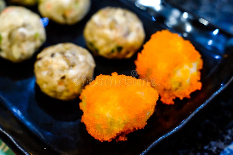 Frying fish ball stock image. Image of ingredients, raised - 91001199