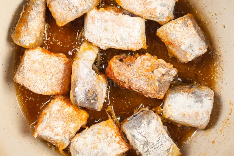 Frying Hake Fish in the Hot Oil with Flour Stock Photo - Image of fried ...