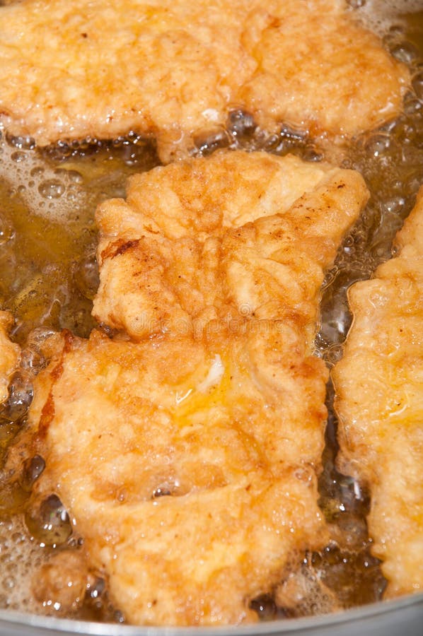 Frying Meat in Hot Oil in a Frying Pan Stock Photo - Image of fillet ...