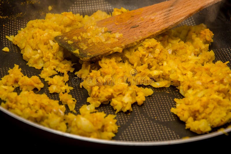 Frying Onion and Curry Condiments in the Pan Stock Image - Image of ...