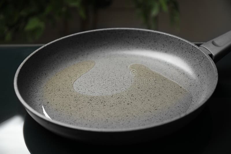 Frying Pan with Cooking Oil on Stove Stock Photo - Image of fresh ...