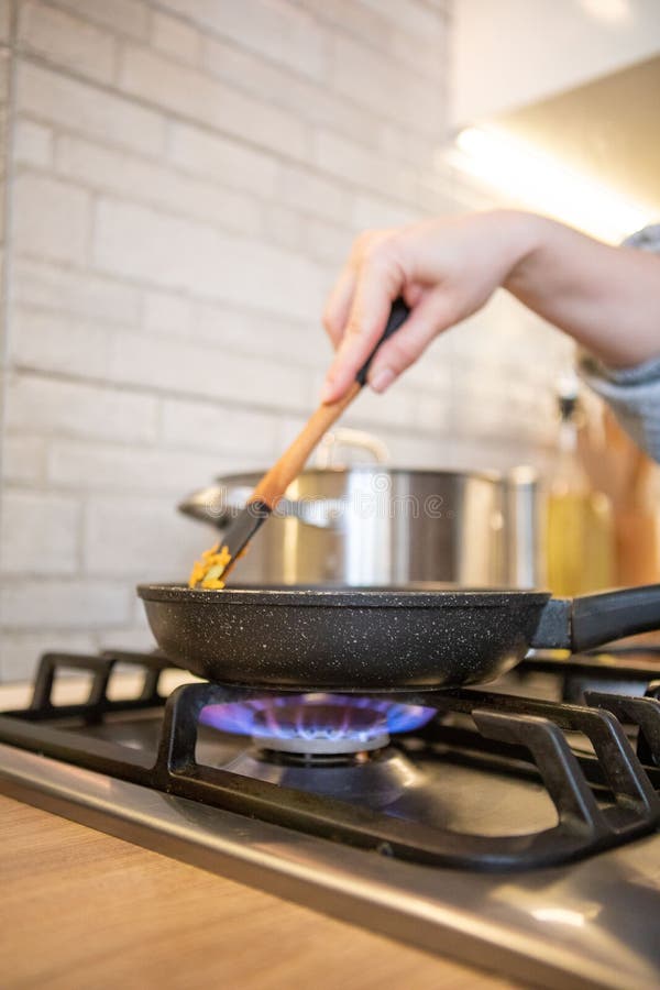Frying Pan on Cooking Top Blue Flame Stock Photo - Image of fried, food ...