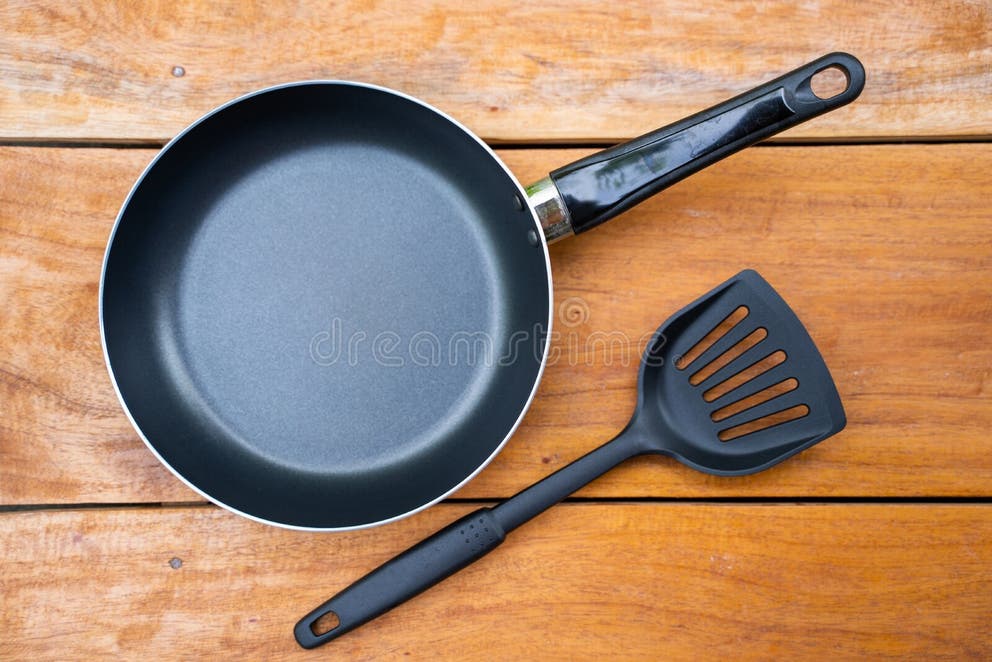 Frying Pan and Flipper Used in Frying for Cooking Stock Photo - Image ...