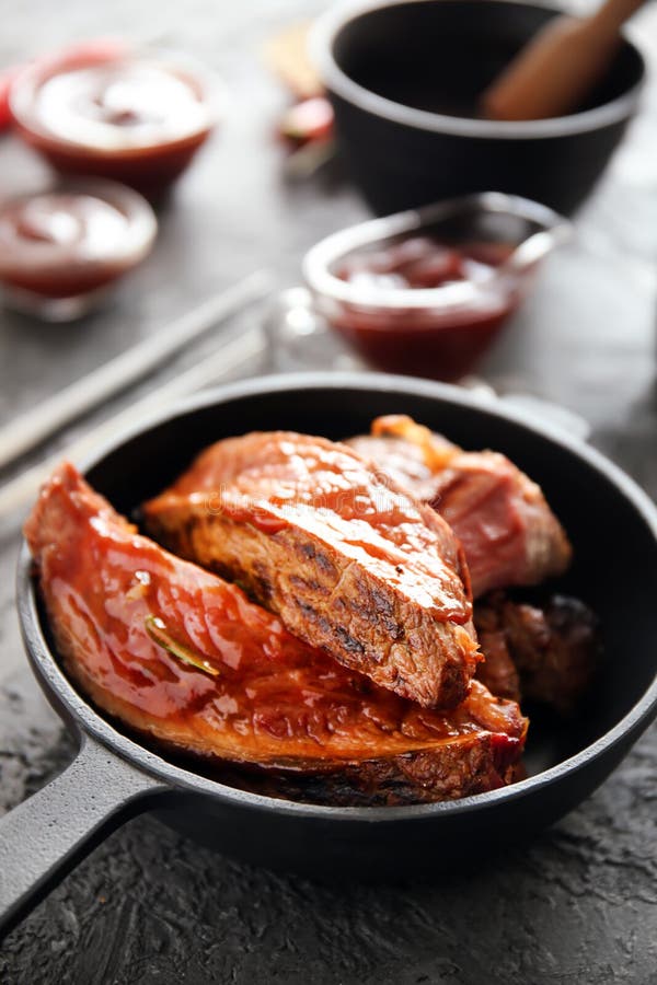 Frying Pan with Grilled Meat on Table Stock Image - Image of food ...