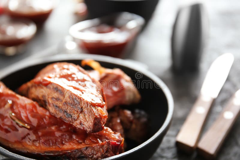 Frying Pan with Grilled Meat on Table Stock Image - Image of delicious ...