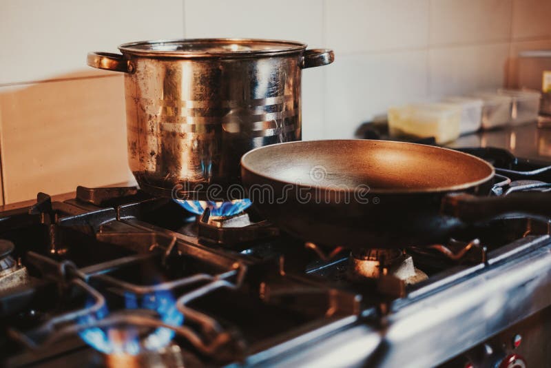 Frying Pan Heating on the Kitchen Stove Stock Image - Image of industry ...