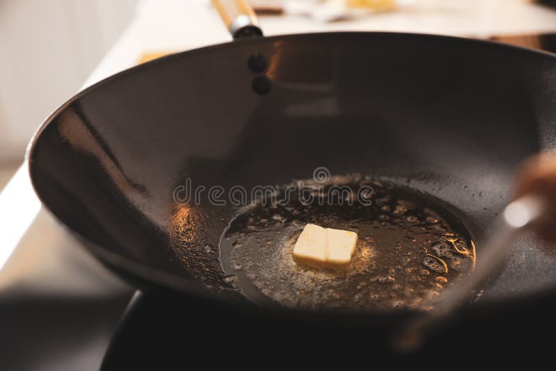 Frying Pan with Melted Butter on Stove, Closeup Stock Image - Image of ...