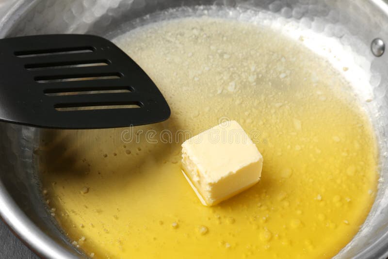 Frying Pan with Melting Butter and Spatula Stock Image - Image of melt ...