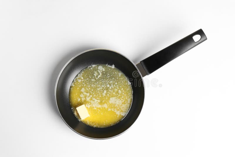 Frying Pan with Melting Butter on White Background Stock Image - Image ...