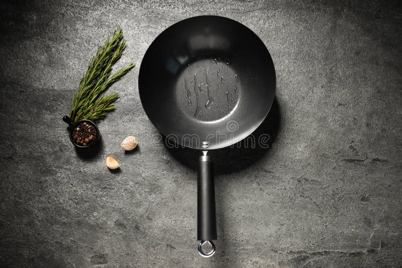 Frying Pan with Oil and Spices on Gray Textured Table, Flat Lay Stock ...