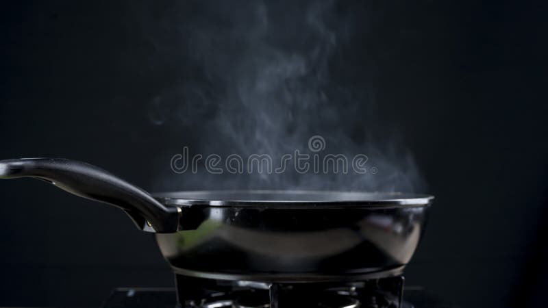 Frying Pan, Steaming Pot In The Kitchen Interior Stock Photo - Image of ...