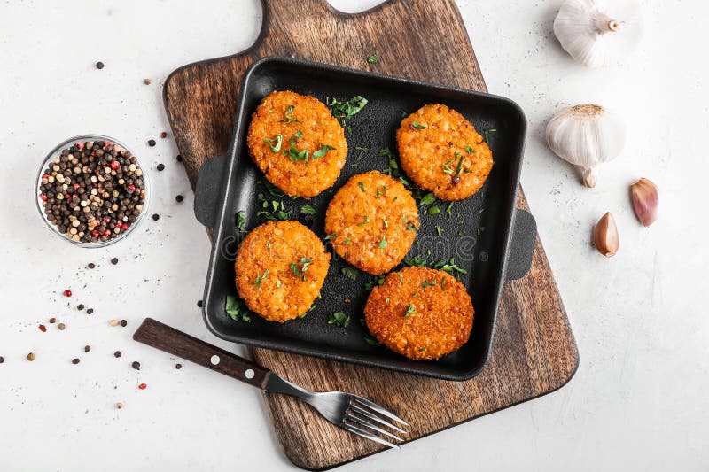 Frying Pan with Tasty Lentil Cutlets on Table Stock Image - Image of ...