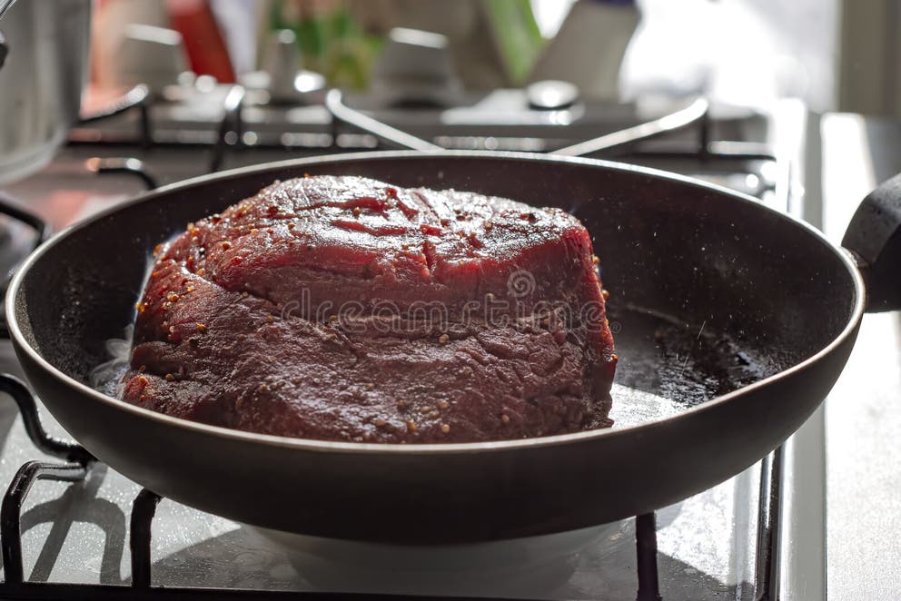 Frying a Pice of Beef Meat in the Pan Stock Image - Image of rare ...
