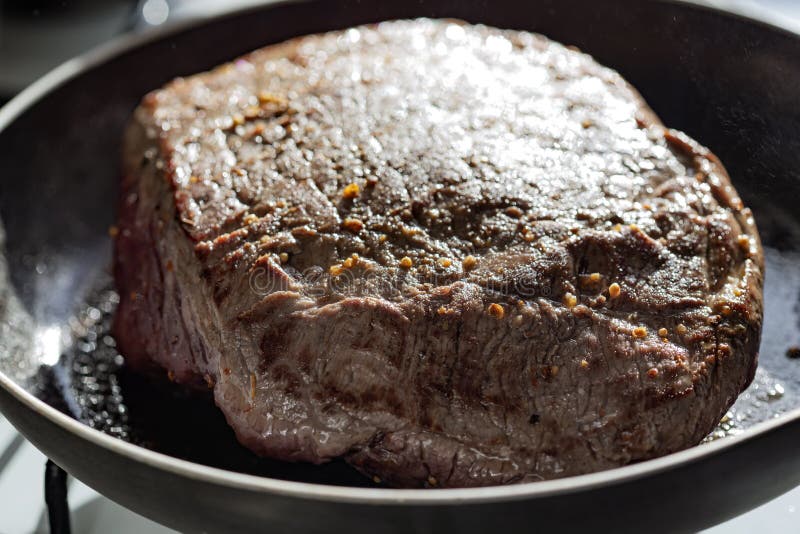 Frying a Pice of Beef Meat in the Pan Stock Photo - Image of rare ...
