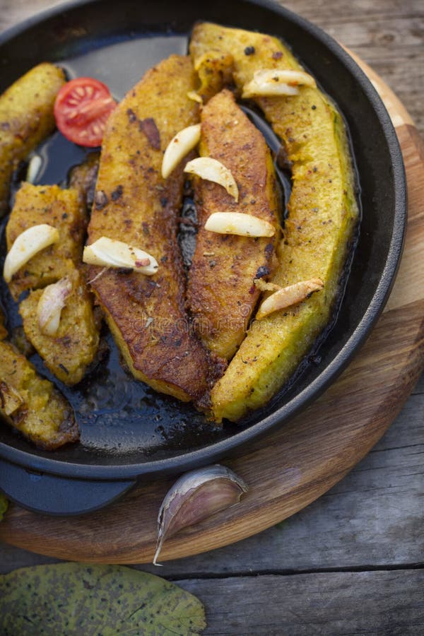 Frying Pan with Slices of Chicken Fillet on Table Stock Image - Image ...