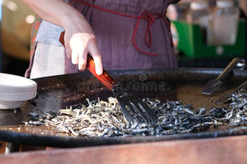 Frying vendace fish stock image. Image of hand, huge - 344565309