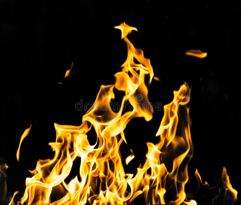 Fuego De La Llama En Fondo Negro Foto de archivo - Imagen de primer ...
