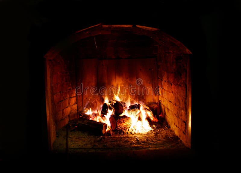 Fuego en chimenea imagen de archivo. Imagen de chimenea - 9923163