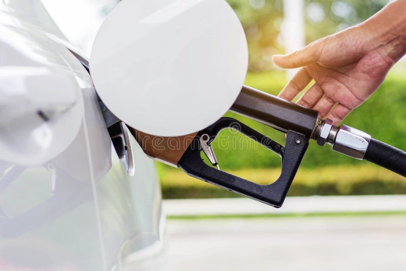 The Fuel Nozzle Inside a Car. Stock Photo - Image of automobile, refill ...