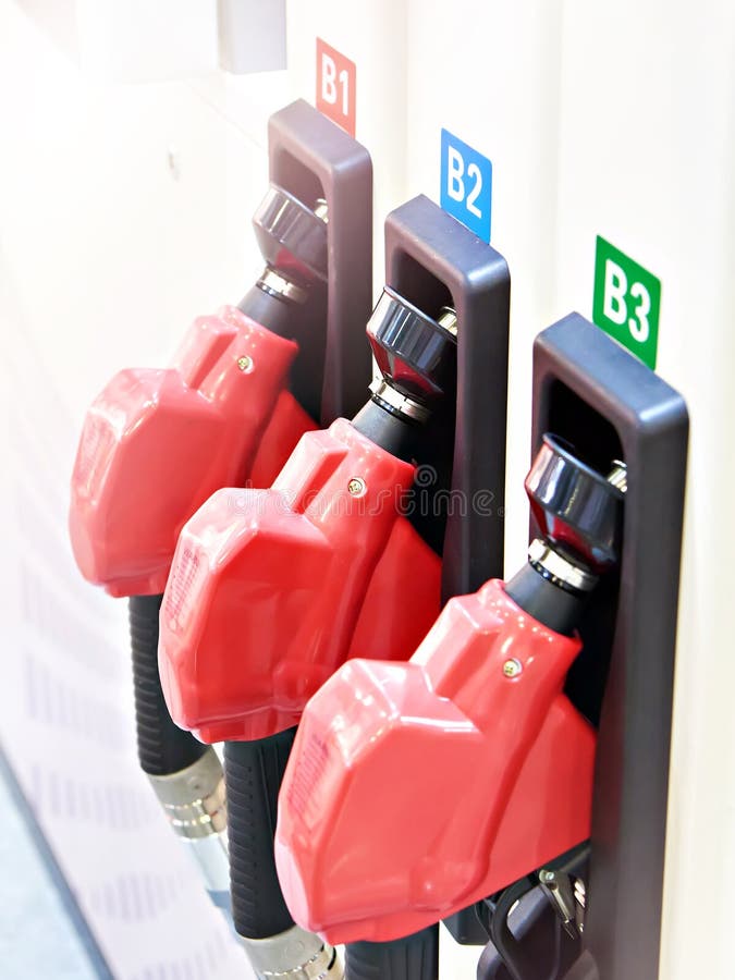 Fuel Nozzles for Diesel, Petrol and Speed Showing a Petrol Pump Fuel ...