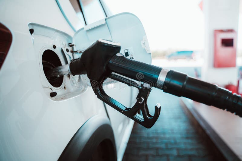 Fuel Pump Fill a Tank of a Car in a Station Stock Photo - Image of ...