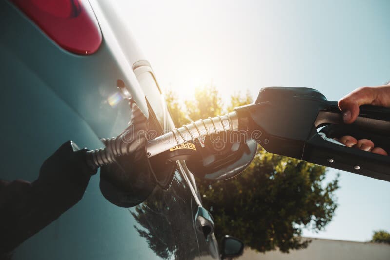 Fuel Pump Fill a Tank of a Car in a Station Stock Photo - Image of ...
