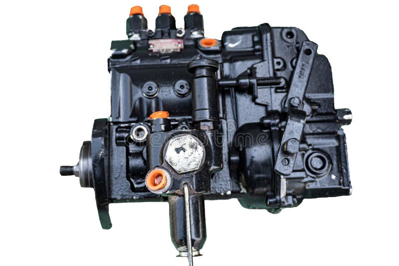 The Fuel Pump Parts of a Tractor Engine are Isolated on a White ...