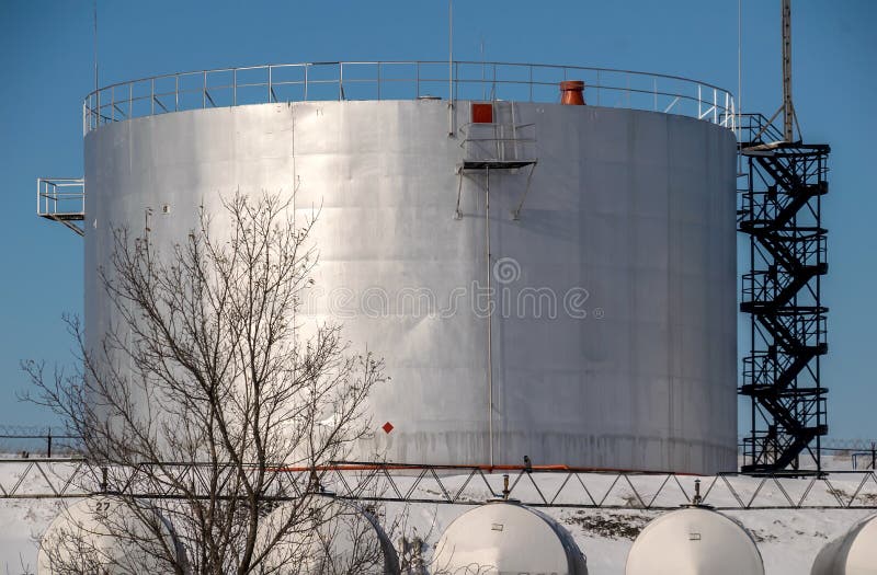 Fuel Storage Tanks in the Protected Area in Winter Stock Image - Image ...