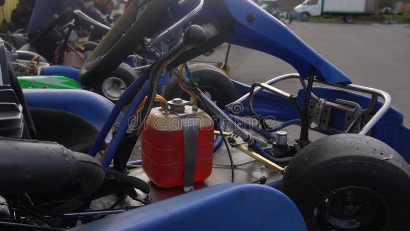 Fuel tank in a racing car stock footage. Video of mechanic - 314160748