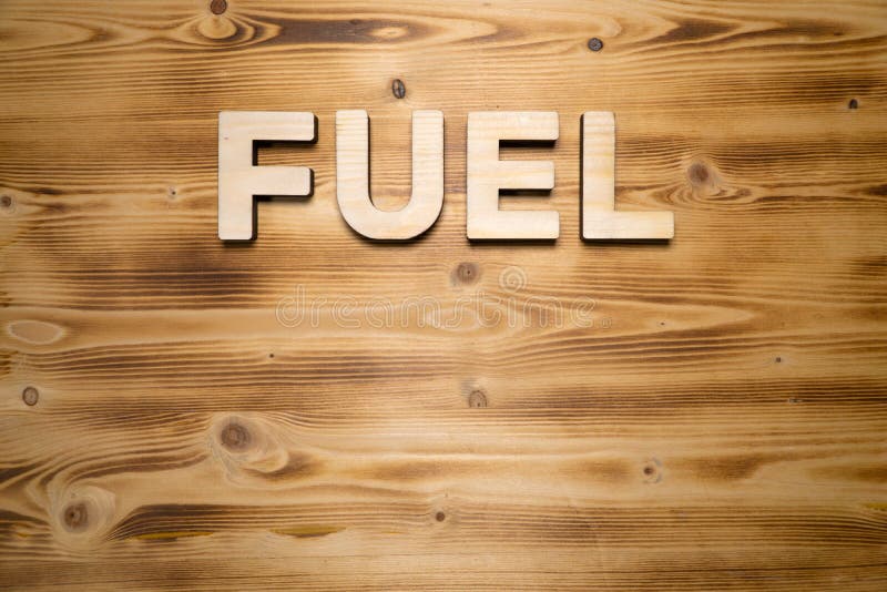FUEL Word Made with Building Blocks on Wooden Board Stock Photo - Image ...