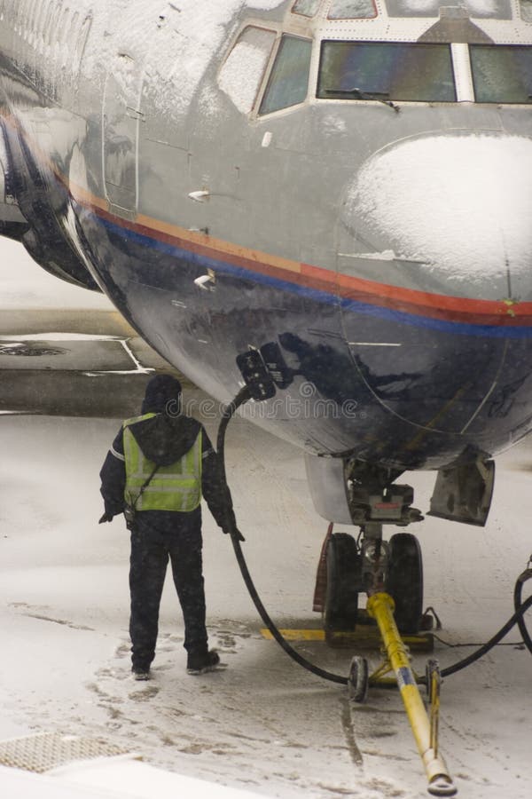 Fueling the aircraft stock photo. Image of chicago, engine - 4358296