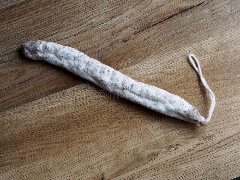 Cut Spanish Sausage or Salami Chorizo. Isolated on White Stock Image ...