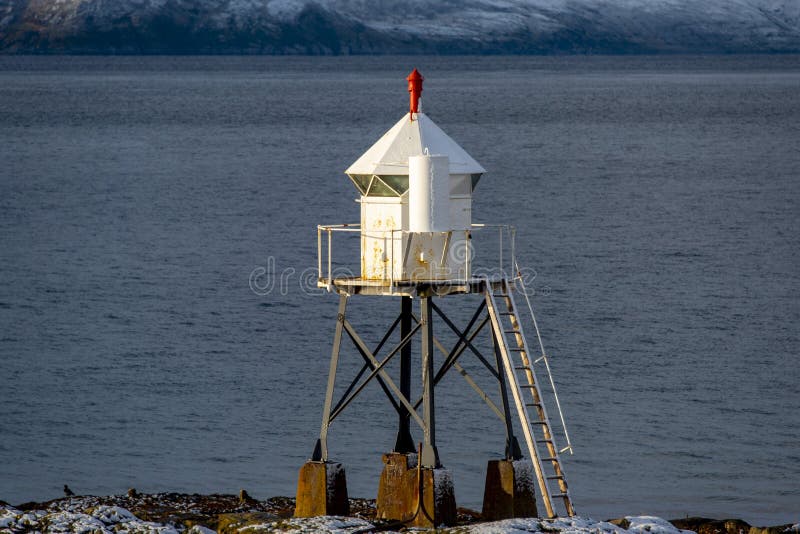 Fuglenes Lighthouse stock photo. Image of white, waves - 386440602