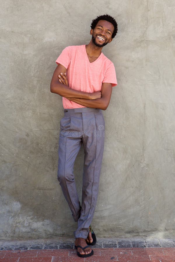 Full Body Handsome African American Man Smiling With Arms Crossed Stock