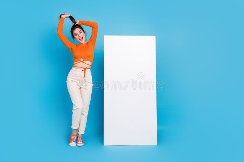 Full Body Photo Of Impressed Millennial Brunette Lady Stand Near Promo