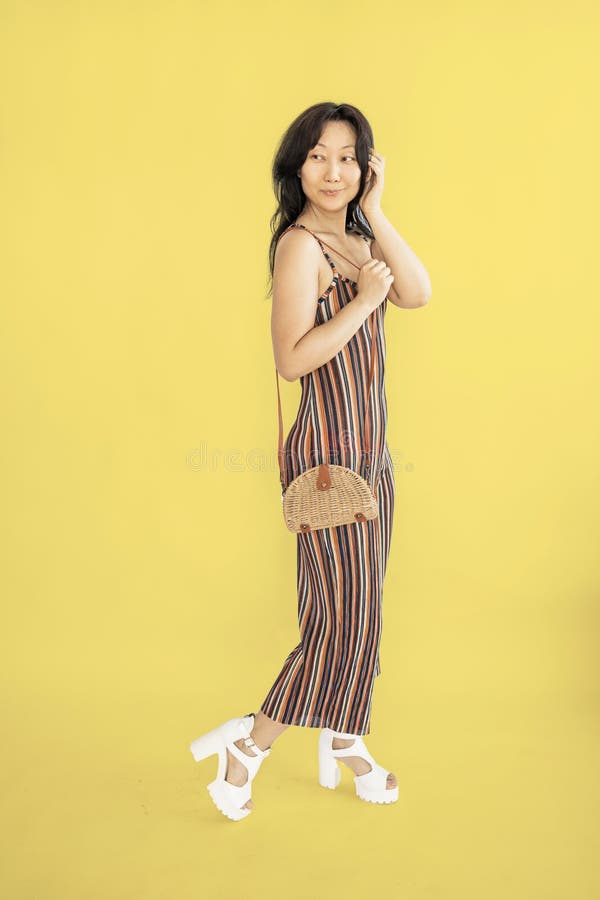 Full Body Portrait Of Cheerful Asian Woman Have Good Mood Isolated On